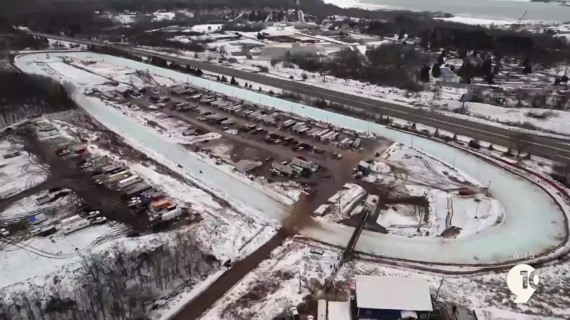 Snowmobile racers compete in four qualifying rounds for I-500 race on ...