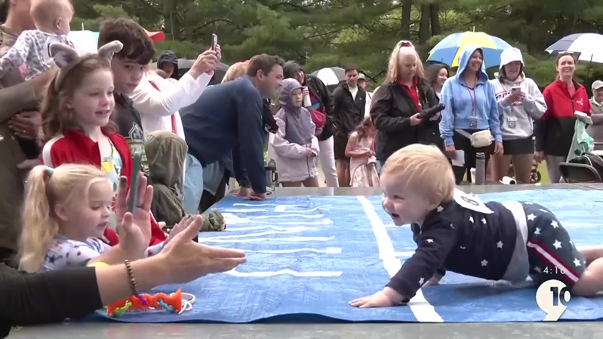 Young NCF festivalgoers compete in the annual ‘Diaper Derby’ – 9&10 News